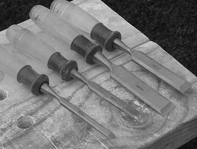 Stone chisels for carving a Oamaru stone sculpture